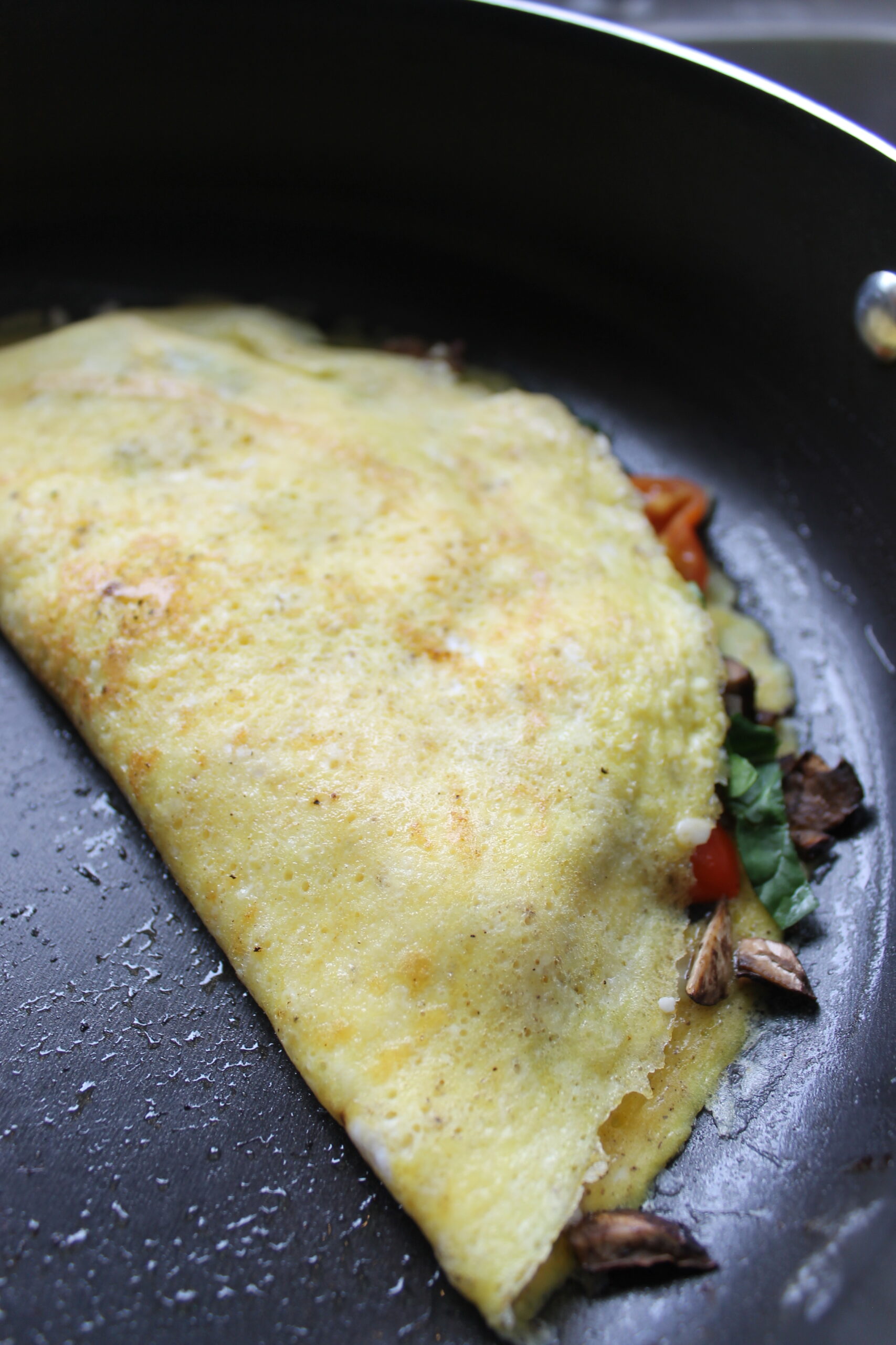 A Loaded Omelette with Sausage, Mushroom, and Feta Cheese - The ...