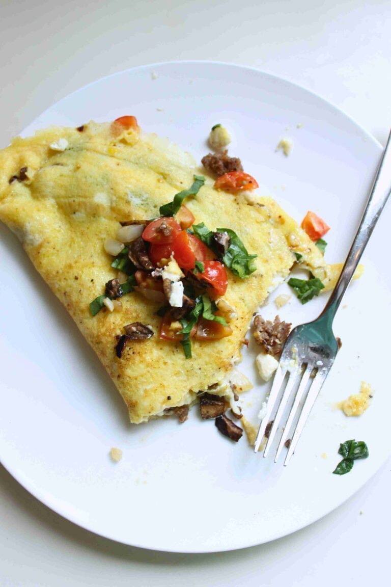 A Loaded Omelette with Sausage, Mushroom, and Feta Cheese - The ...